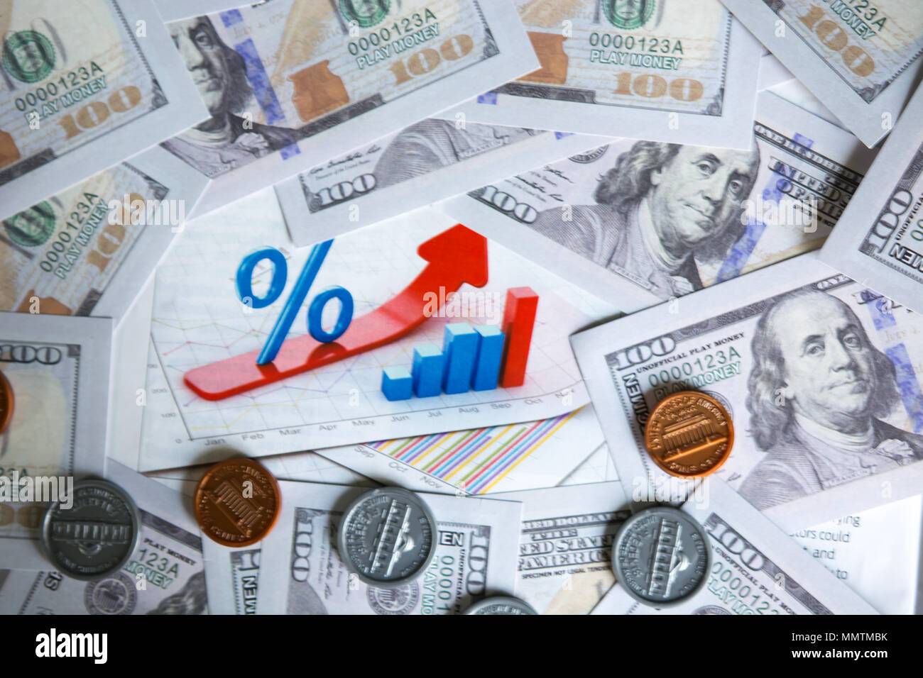 Business Graph with coin on white background Stock Photo - Alamy