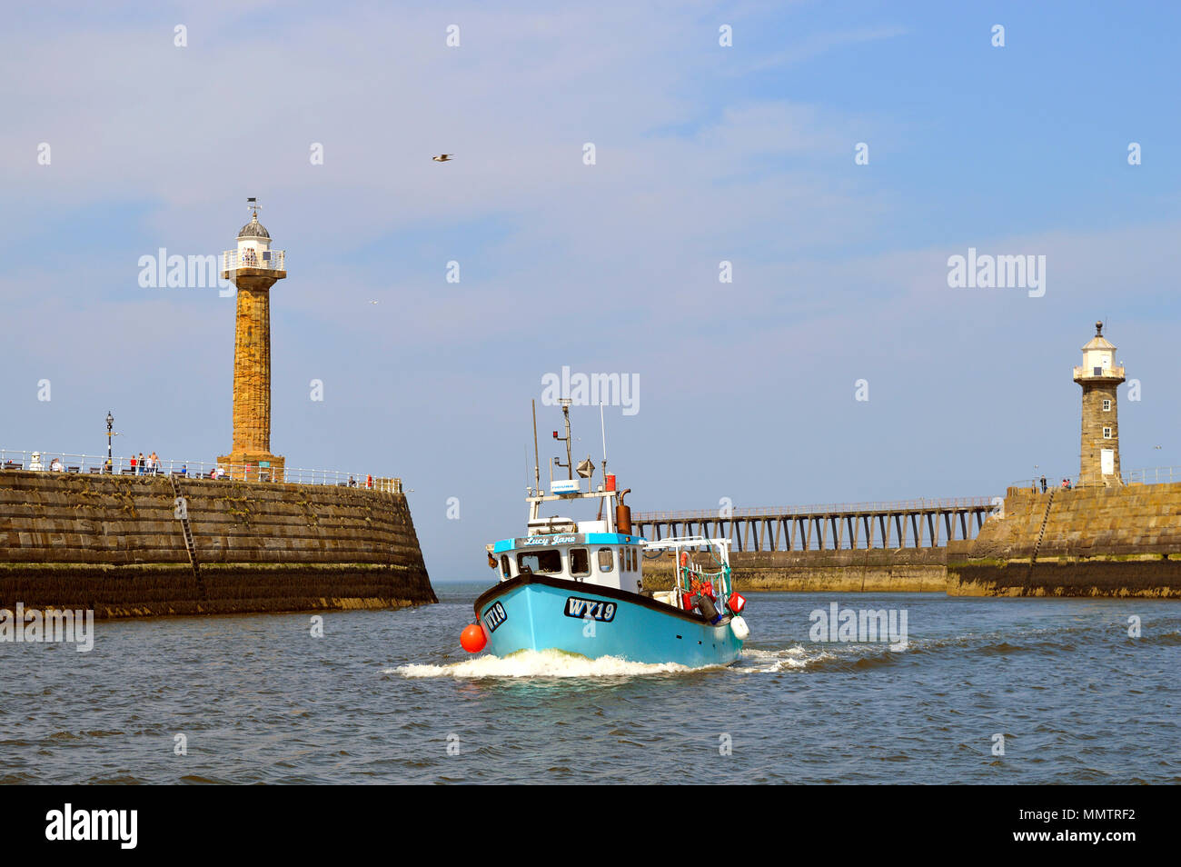 Lucy Jane fishing boat returning to Whitby harbour Stock Photo - Alamy