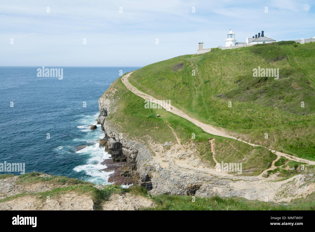 Coastal path, scenery and Anvil Point Lighthouse at Durlston Country ...