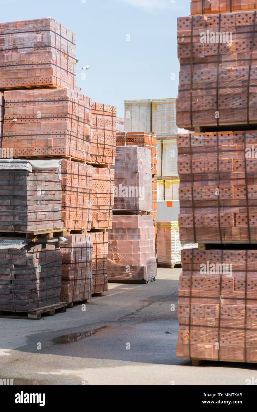 pallets with bricks in the building store. Racks with brick. Masonry ...