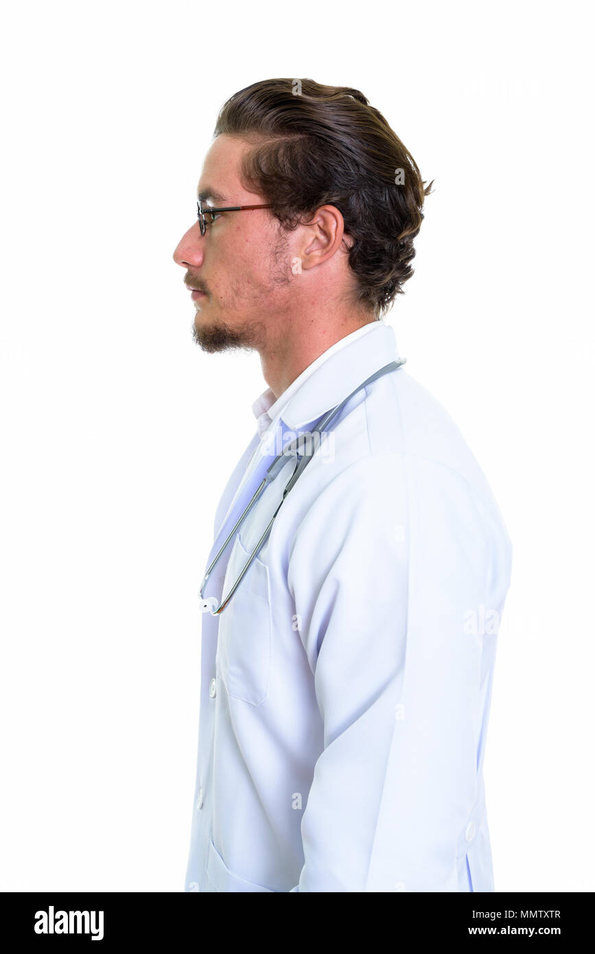 Profile view of young handsome man doctor with eyeglasses isolat Stock ...