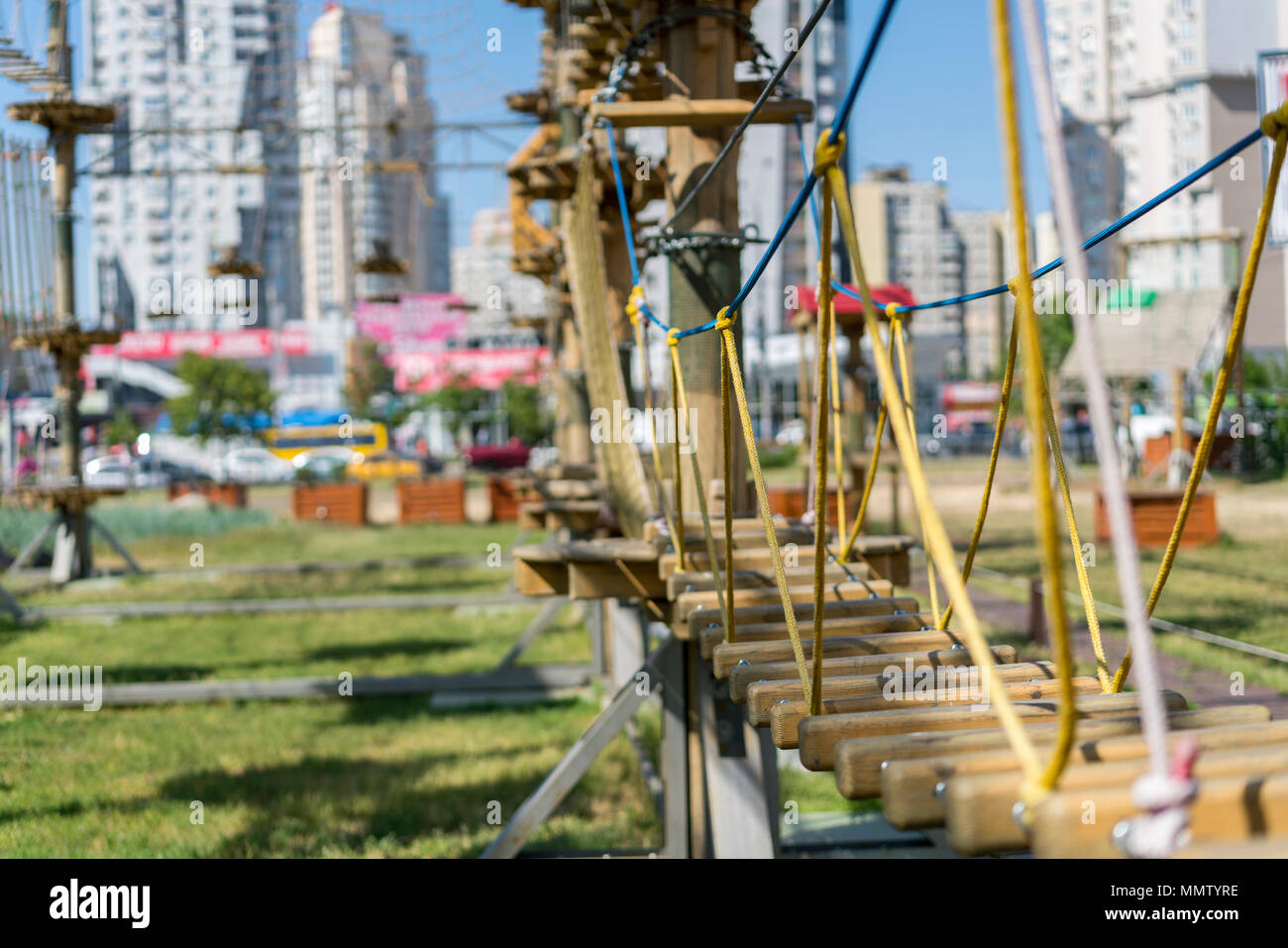 toy rope park for children's outdoor games. Rope adventure park in a ...