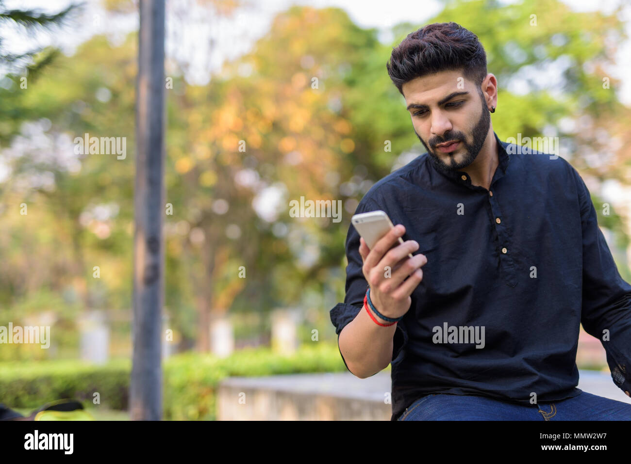 Indian man sitting with portrait hi-res stock photography and images ...