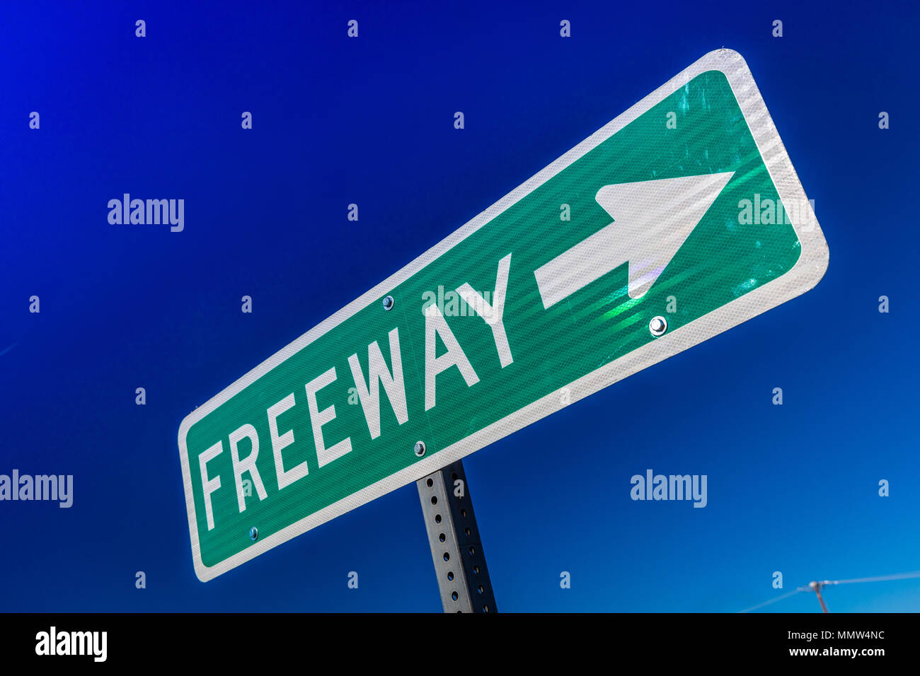 SOUTHERN CALIFORNIA - Green Freeway Sign points to entrance Stock Photo ...