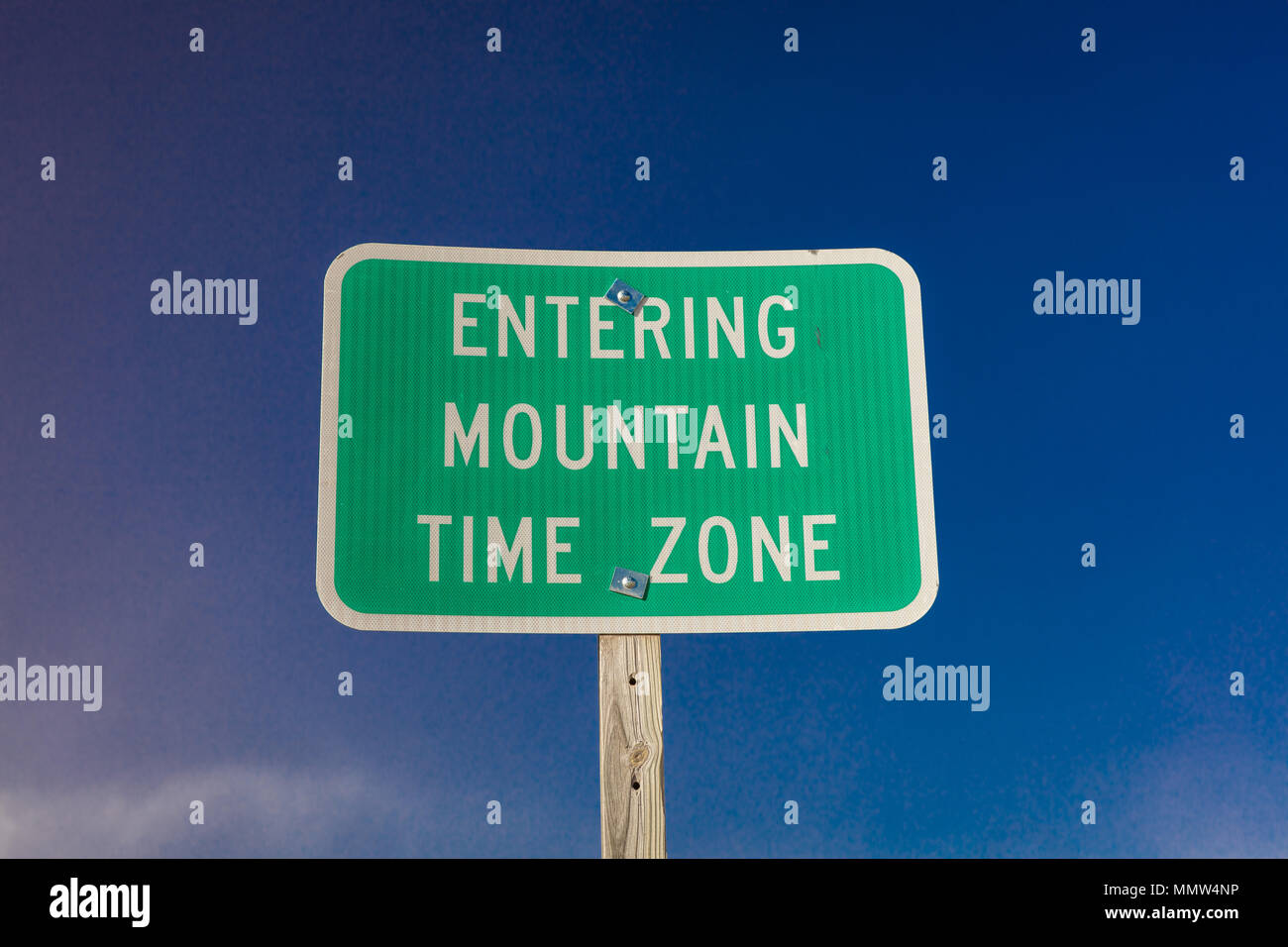 Entering Mountain Time Zone Road Sign Stock Photo - Alamy