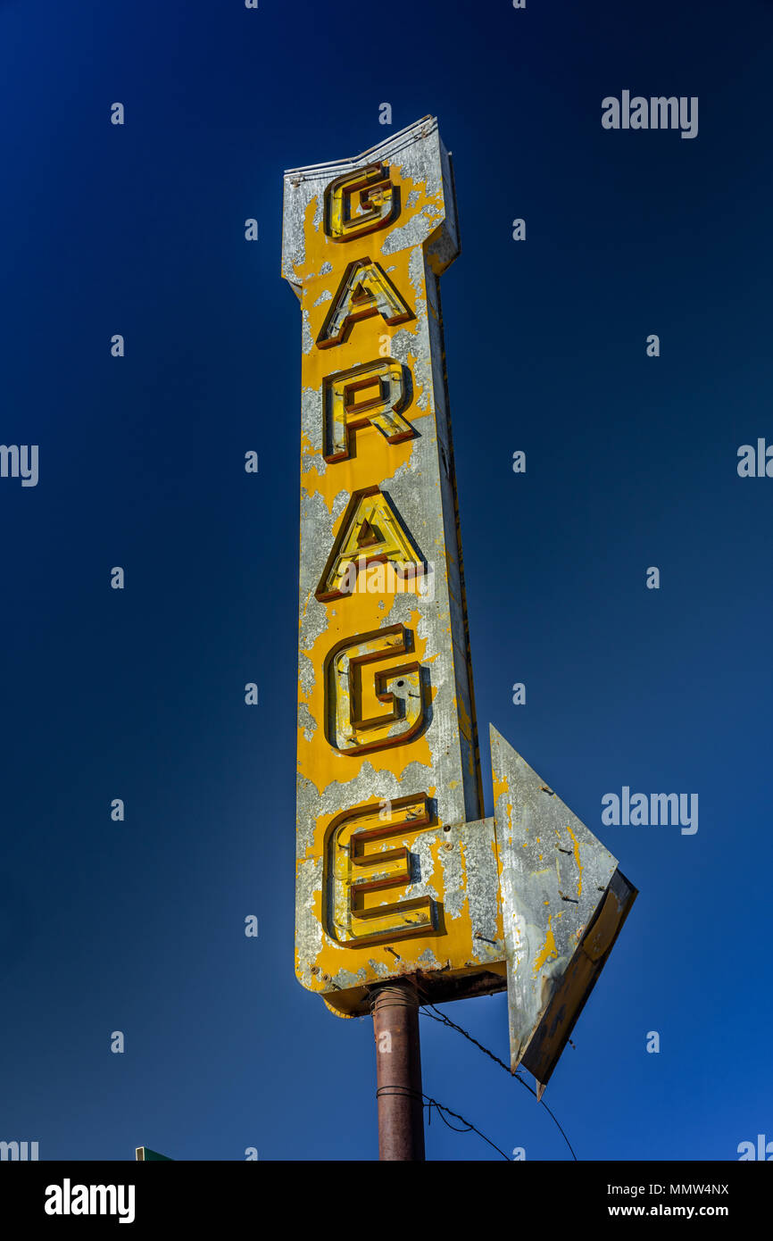 Vintage Neon sign directs drivers to Garage Stock Photo - Alamy
