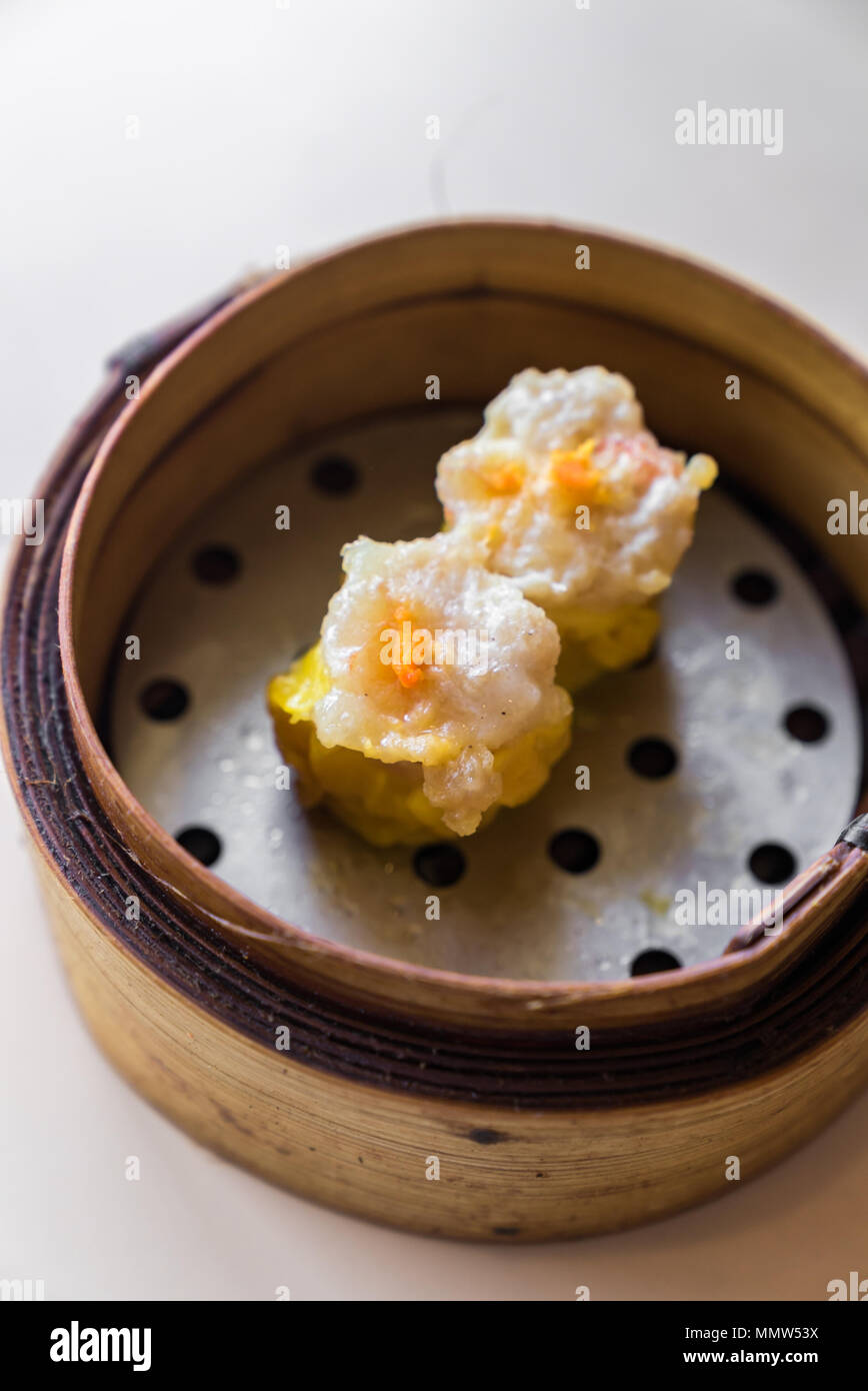 Chinese dim sum in wooden basket Stock Photo - Alamy