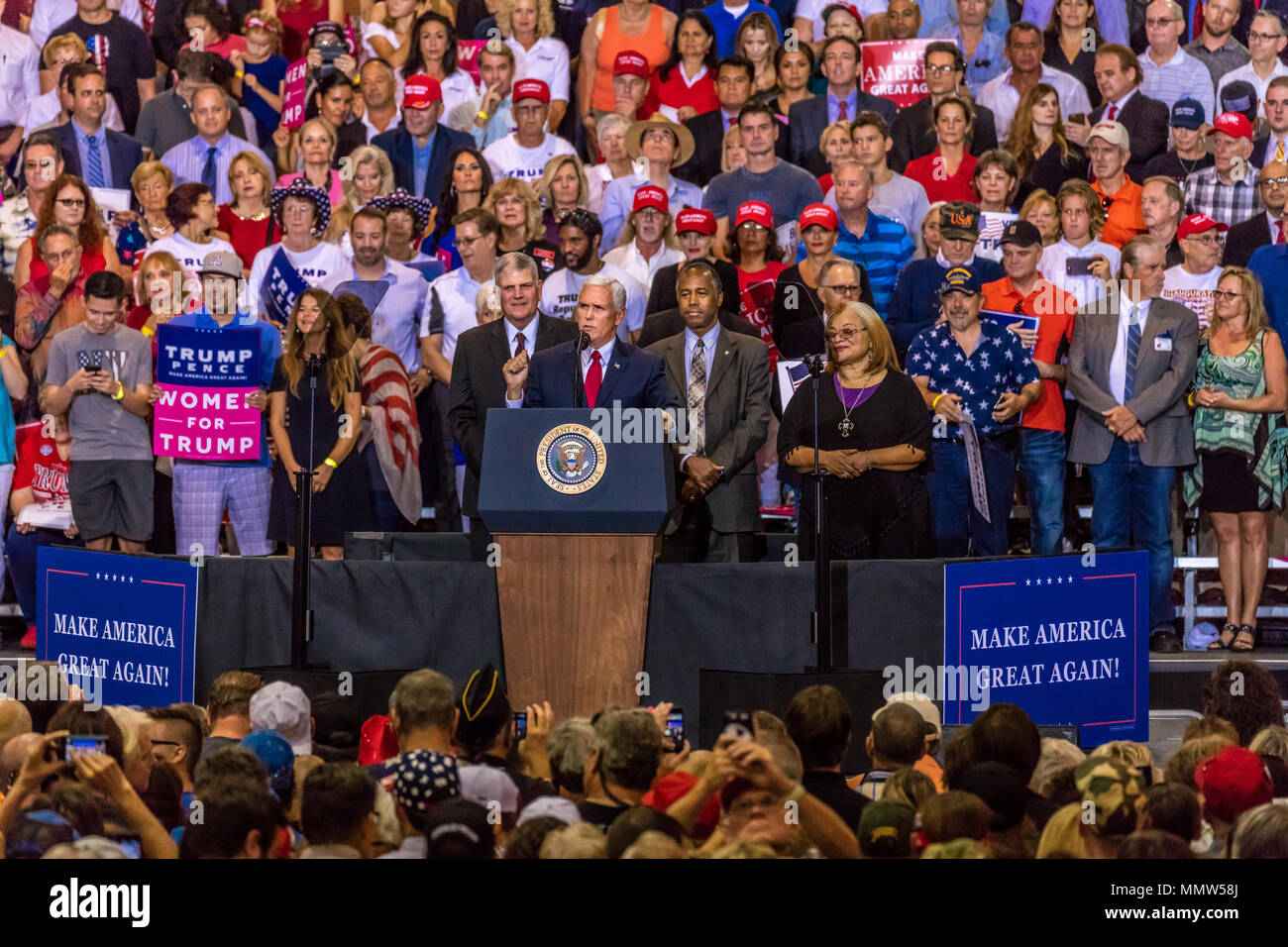 PHOENIX, AZ - AUGUST 22: U.S. Vice President Mike Pence, flanked by ...