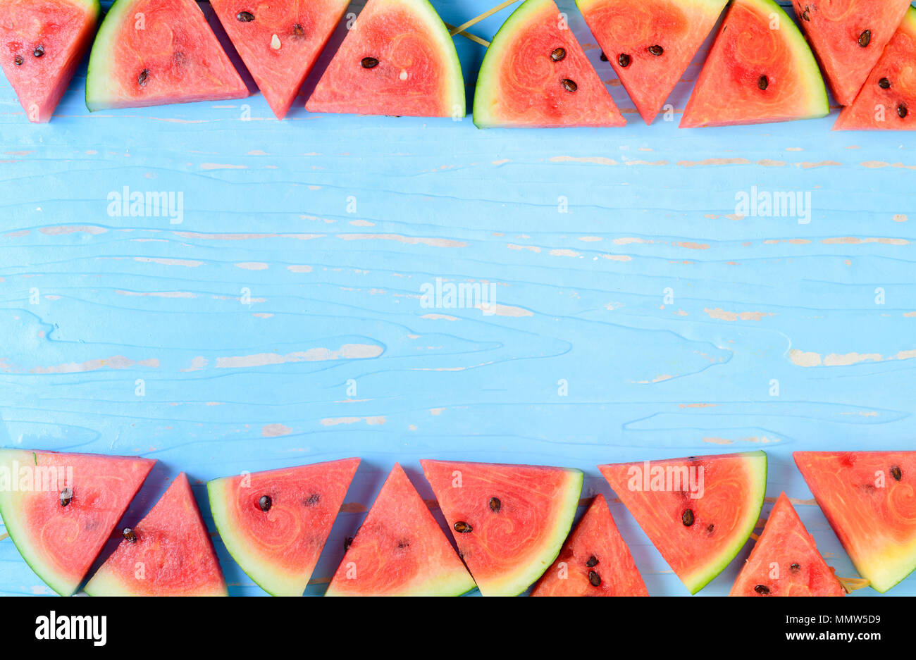 Watermelon slice on a blue rustic wood background, Summer concept Stock ...