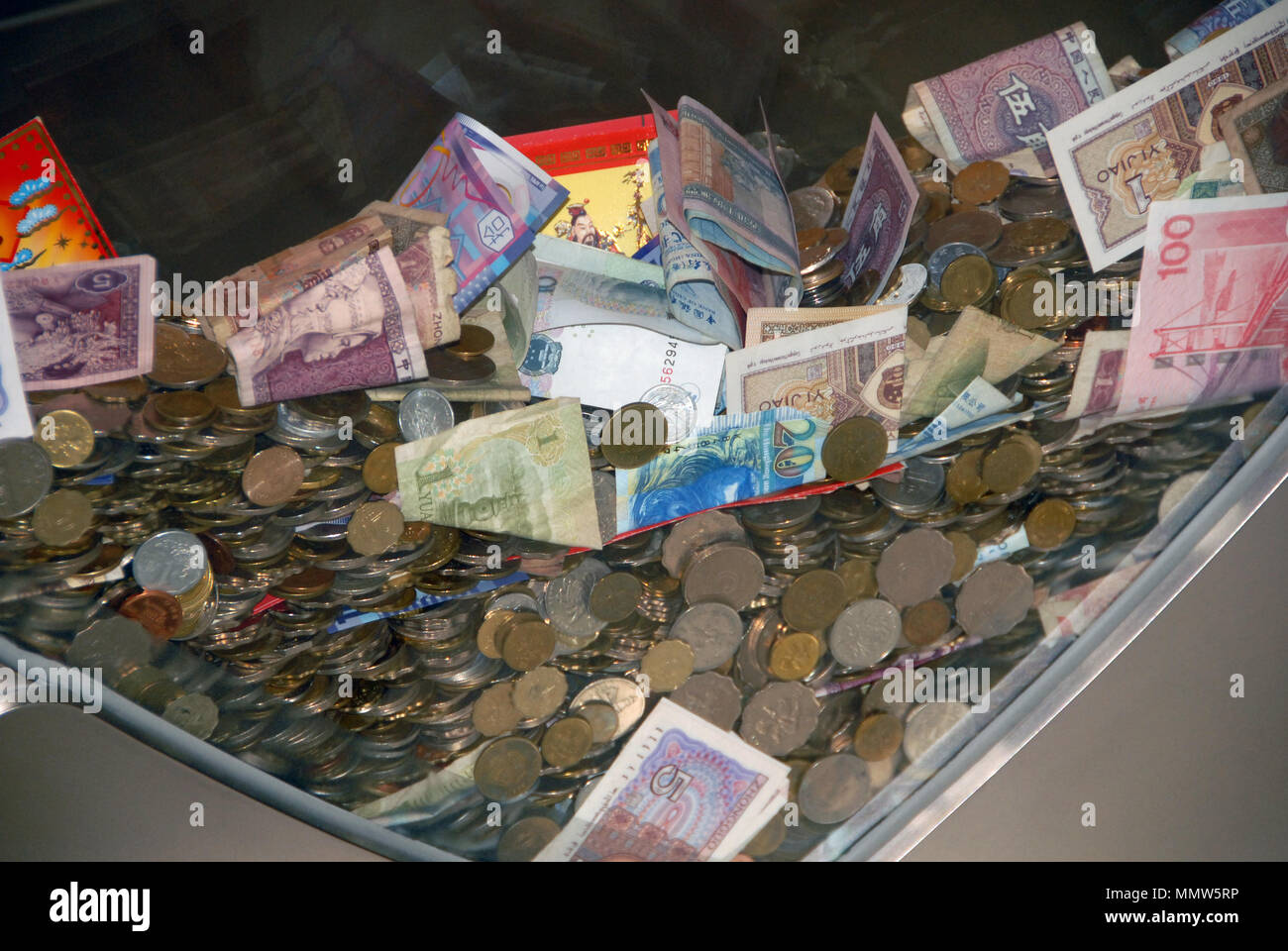 Random currency left over from International trips Stock Photo - Alamy