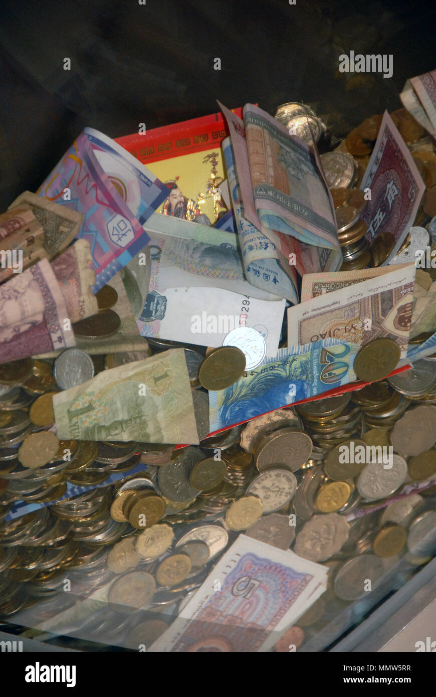 Random currency left over from International trips Stock Photo - Alamy