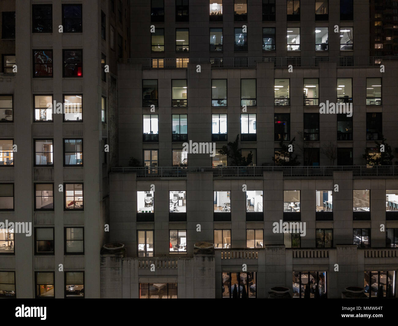 Aerial view of Midtown offices in Manhattan, New York City at night ...