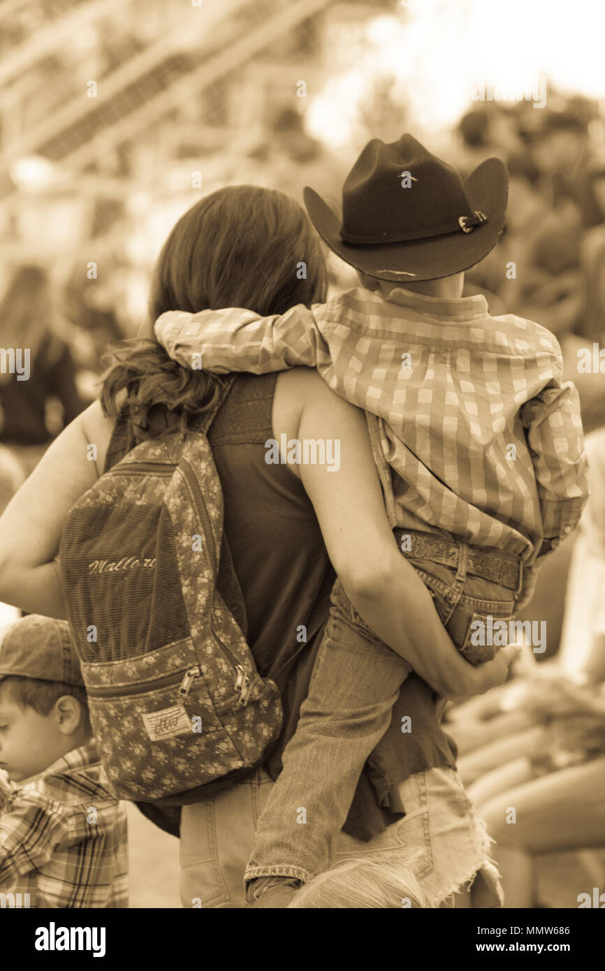 JULY 22, 2017 NORWOOD COLORADO - mother holds little cowboy while ...