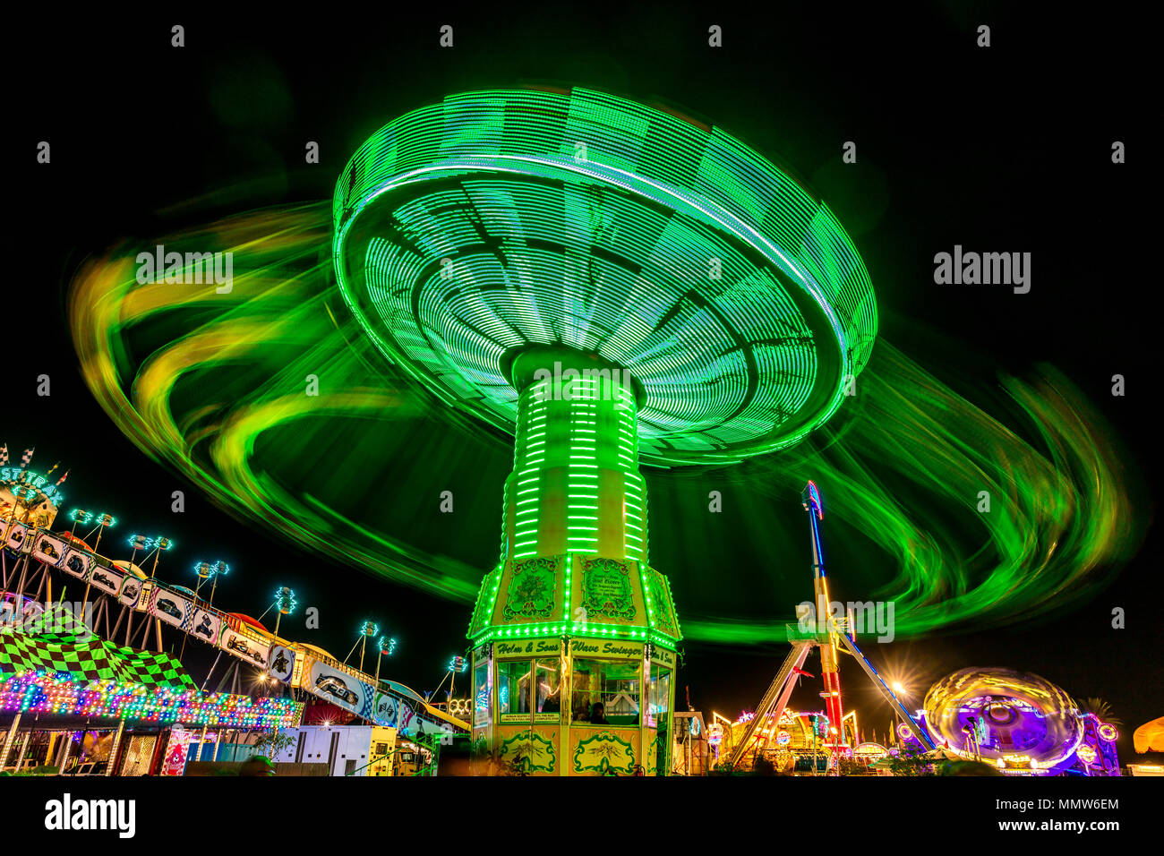July 18, 2017 VENTURA CALIFORNIA - Illuminated fair ride with blurred ...