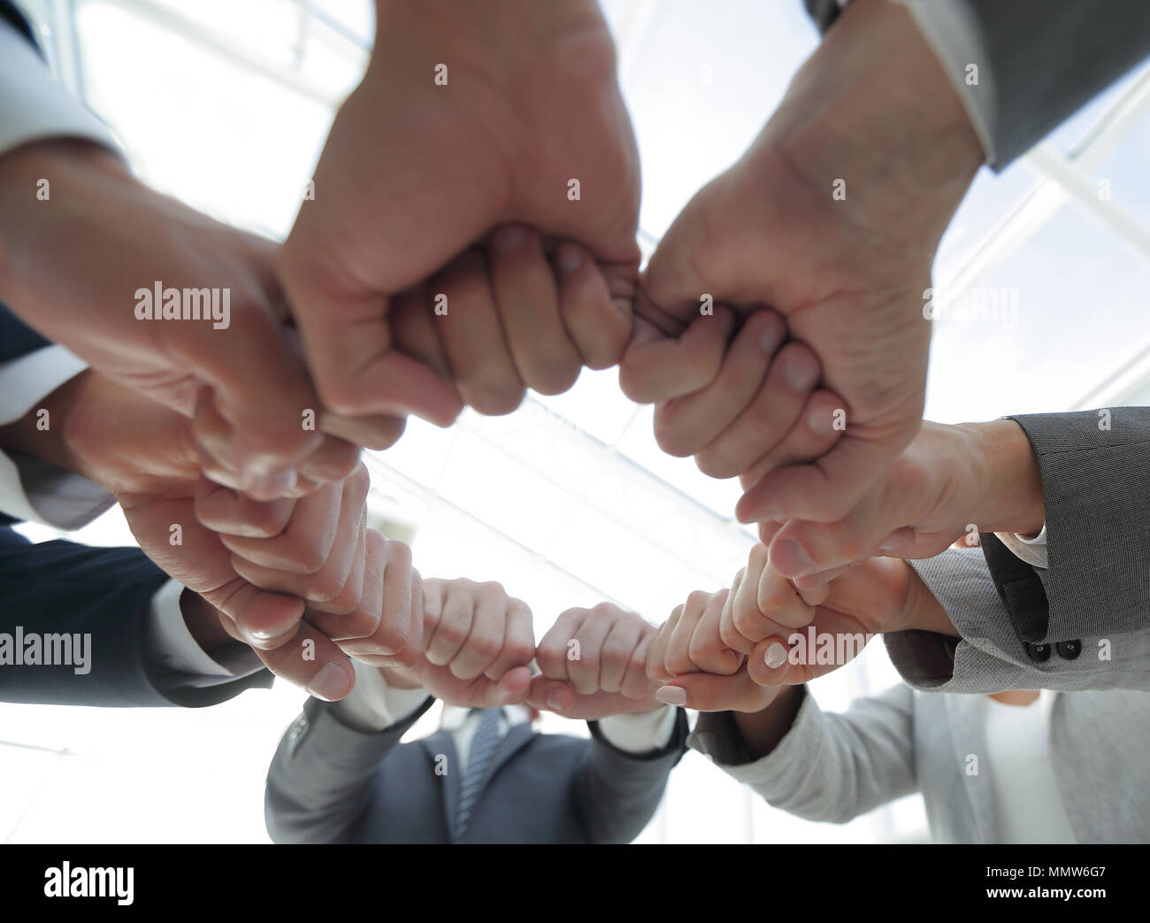 group of people joined their hands Stock Photo - Alamy