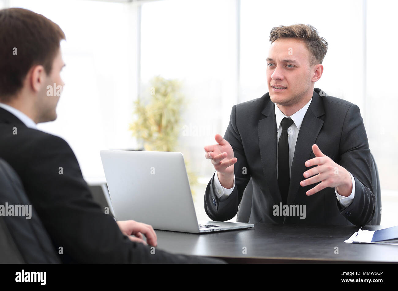 senior Manager conducts the interview with the new employee Stock Photo ...