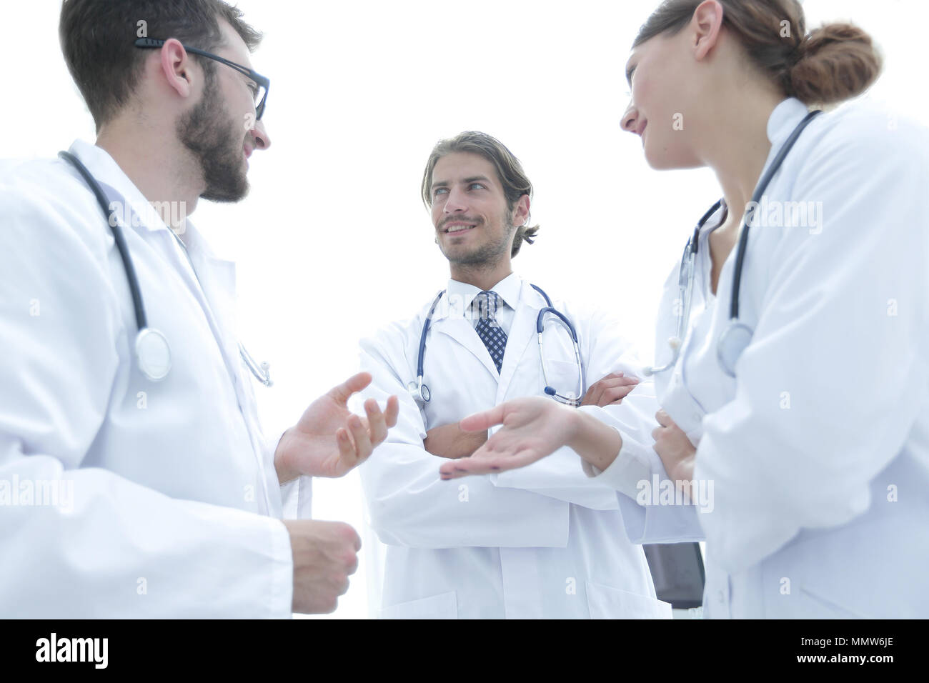 Health care workers colleagues talking hi-res stock photography and ...
