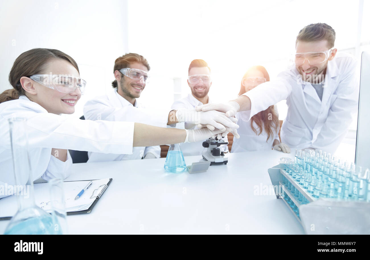creative team of young scientists Stock Photo - Alamy