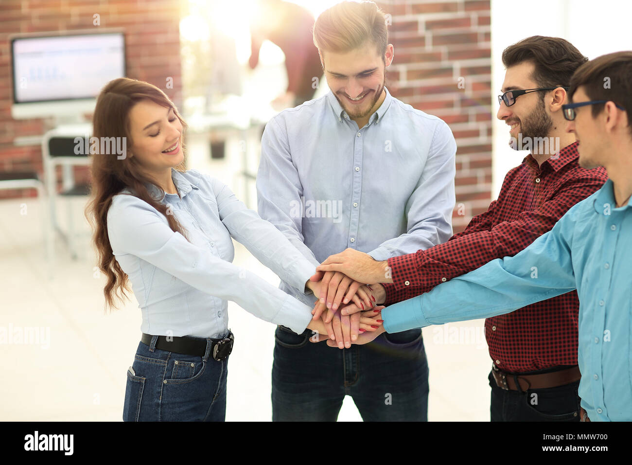 Group of people hands together partnership teamwork Stock Photo - Alamy