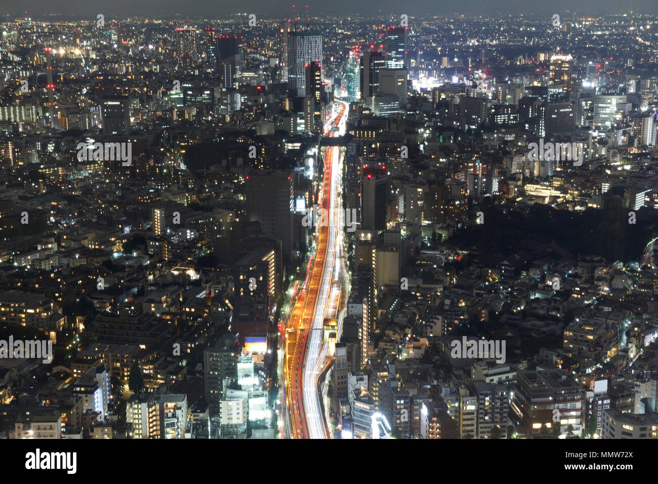 Tokyo city view at night, with a highway crossing the buildings Stock ...