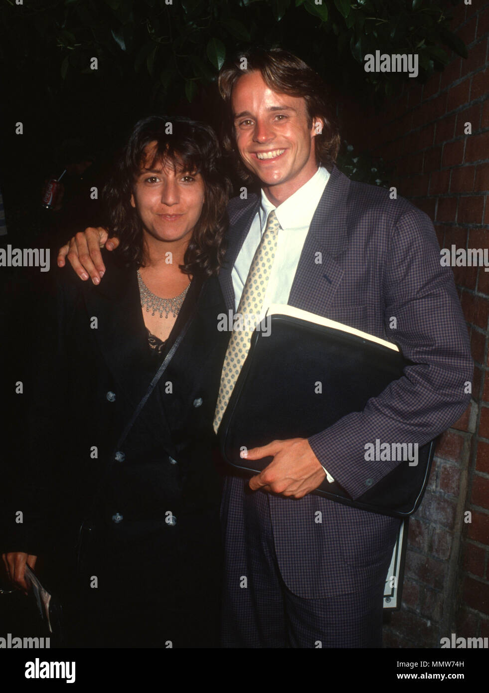 HOLLYWOOD, CA - JULY 12: Actor Mitchell Anderson (R) and guest attend ...