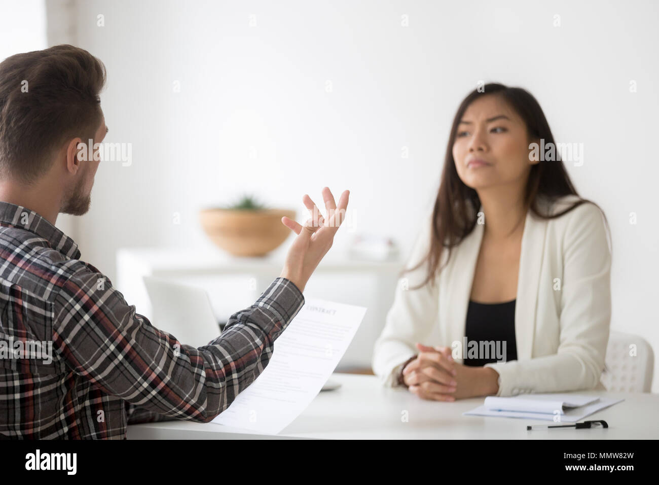 Angry client complaining on bad contract fraud meeting asian law Stock ...