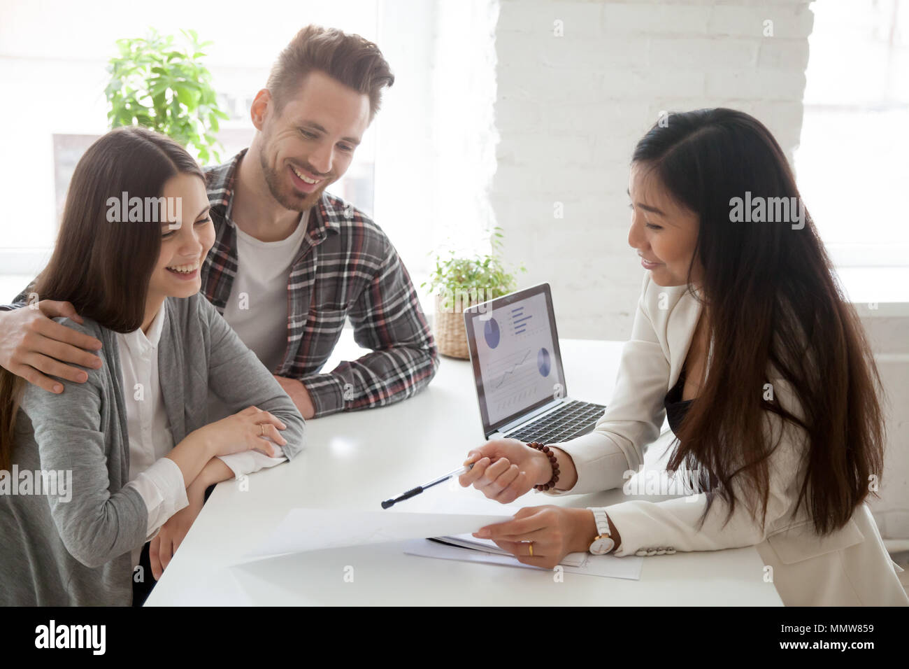 Real estate agent asian family hi-res stock photography and images - Alamy