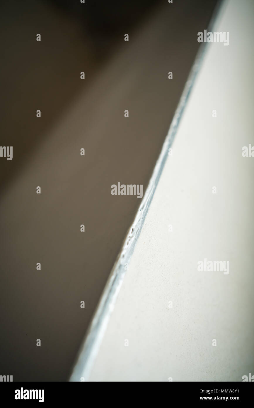 closeup fresh putty applied on the wall corner, shallow focus Stock ...