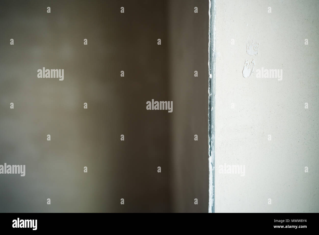 closeup fresh putty applied on the wall, shallow focus Stock Photo - Alamy