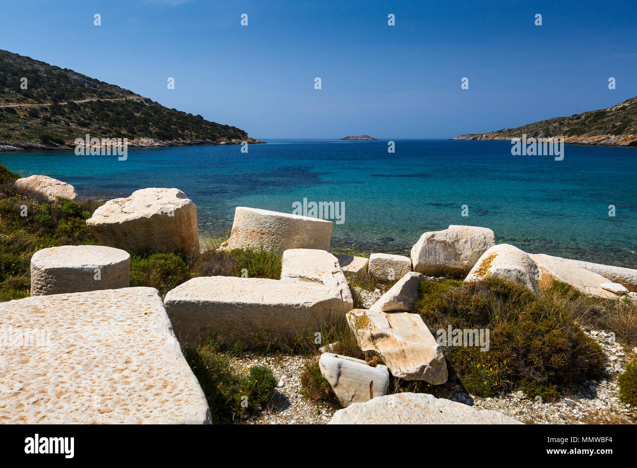 Ancient marble blocks from a nearby quarry on Petrokopi beach on Fourni ...