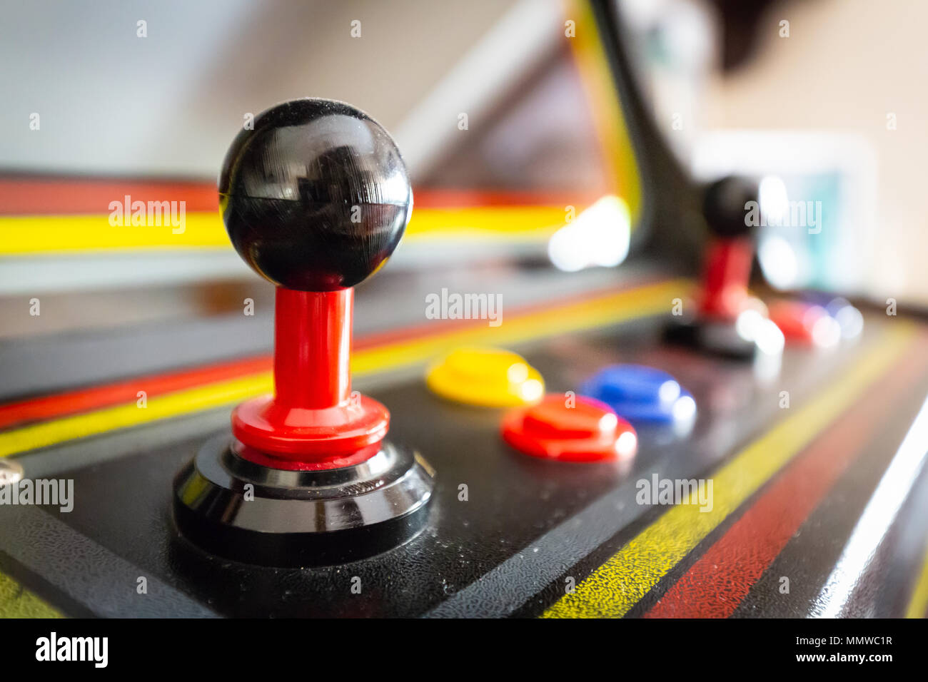Joystick of a vintage arcade videogame - Coin-Op Stock Photo - Alamy