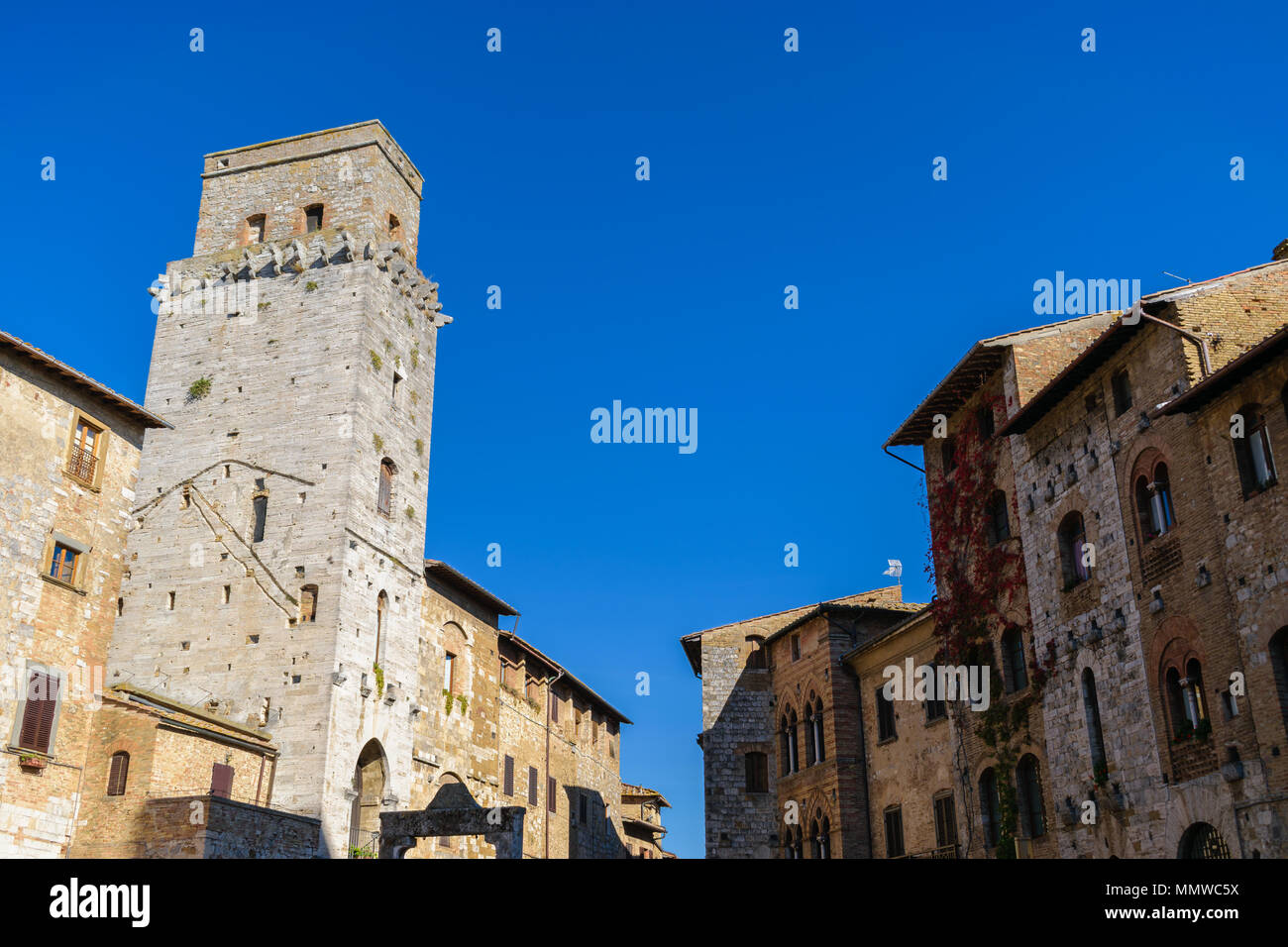 San Gimignano medieval architecture at central square Stock Photo - Alamy