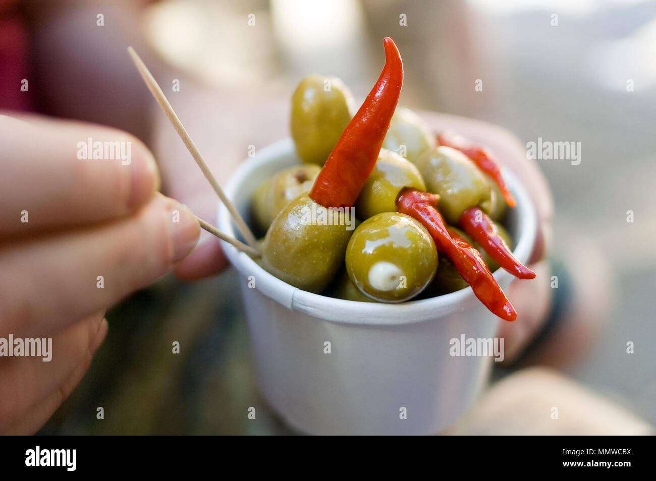 Pepper stuffed olives anyone Stock Photo - Alamy