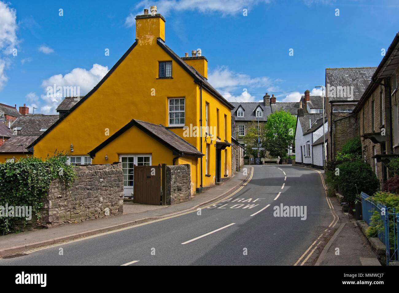 Yellow house in Hay on Wye, Powys, Wales Stock Photo - Alamy