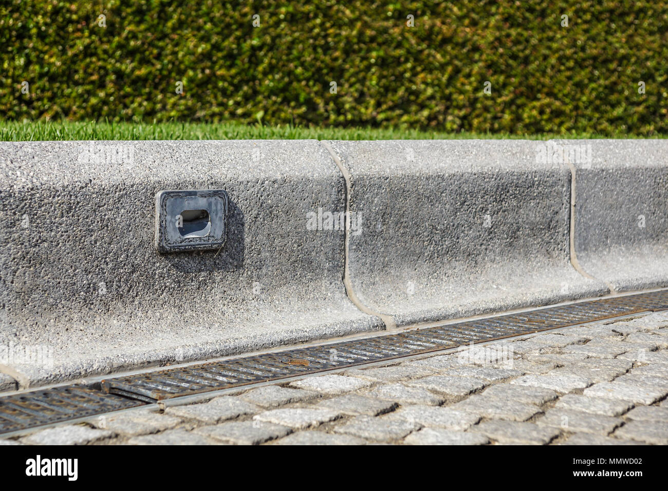 damage Spotlight on small wall at outdoor walkway curb road Stock Photo ...