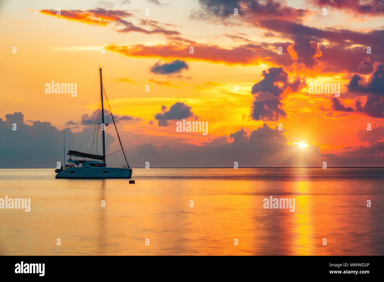 Sunrise over ocean Stock Photo - Alamy