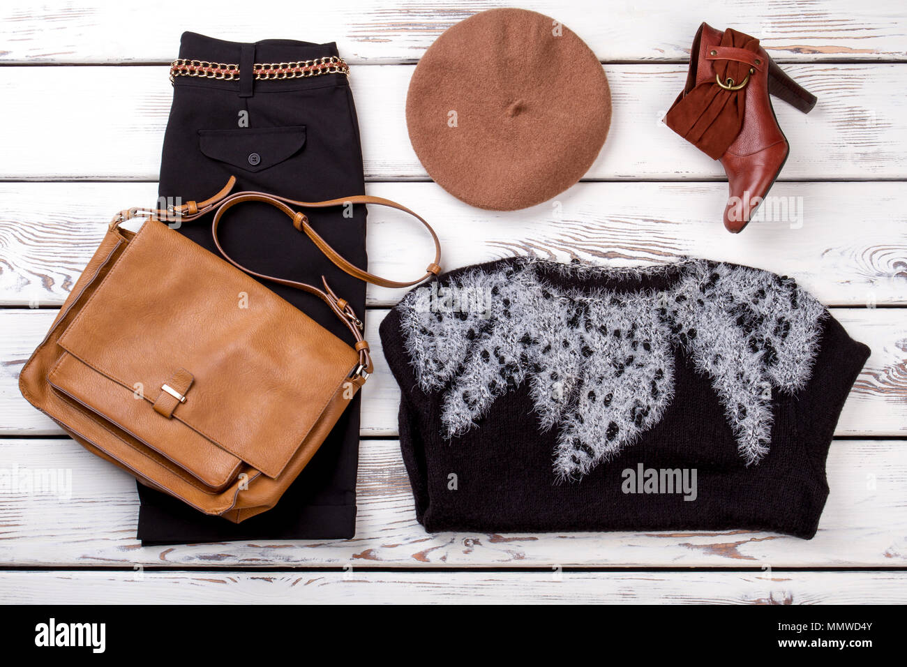 Set of female fashion clothes on showcase Stock Photo - Alamy