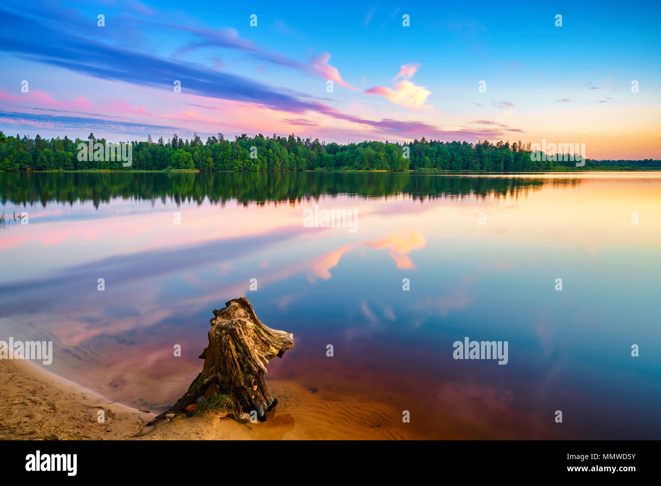 Bright sunset on a lake Stock Photo - Alamy