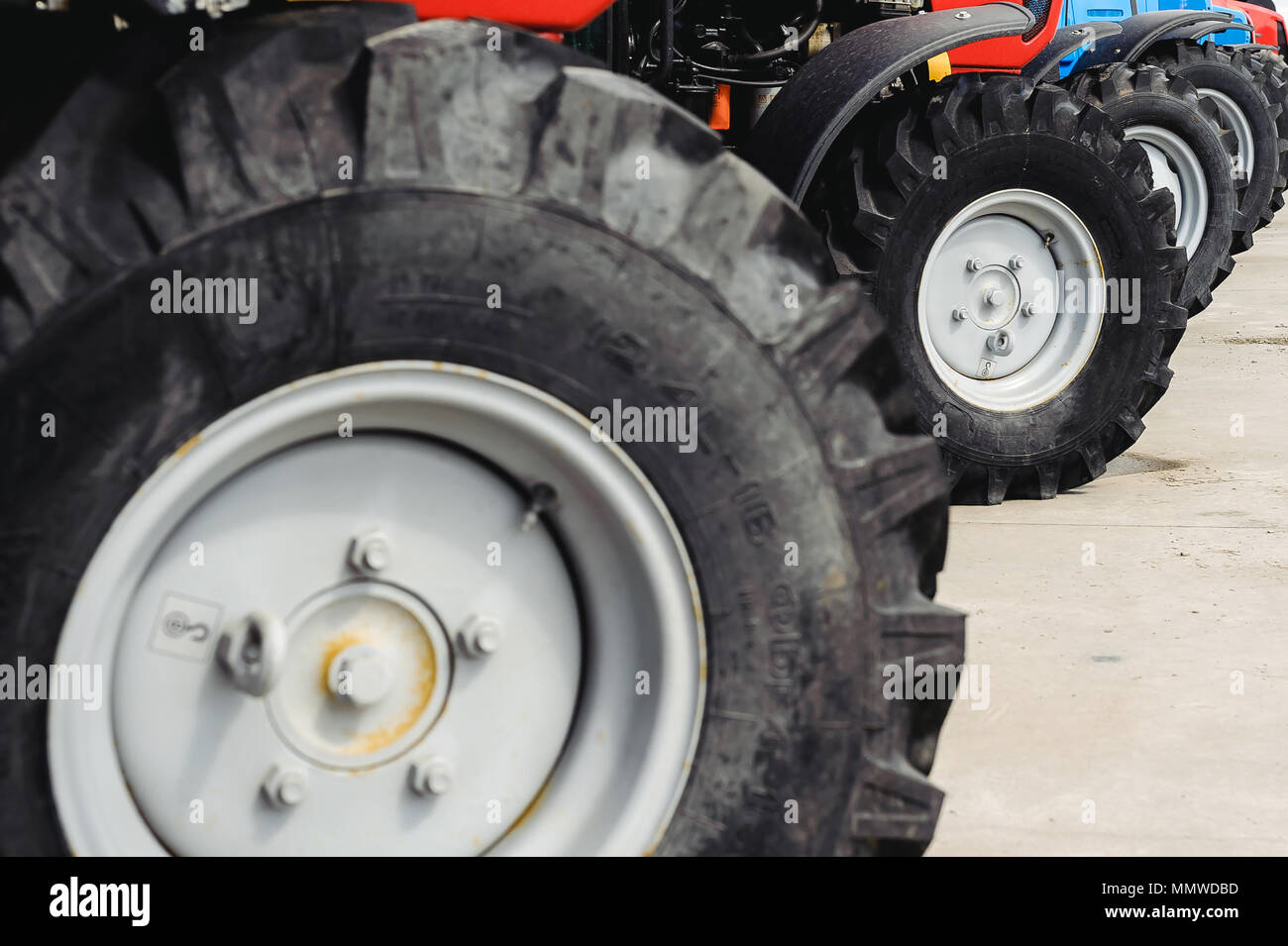 agricultural machinery, tractor wheels in a row Stock Photo - Alamy