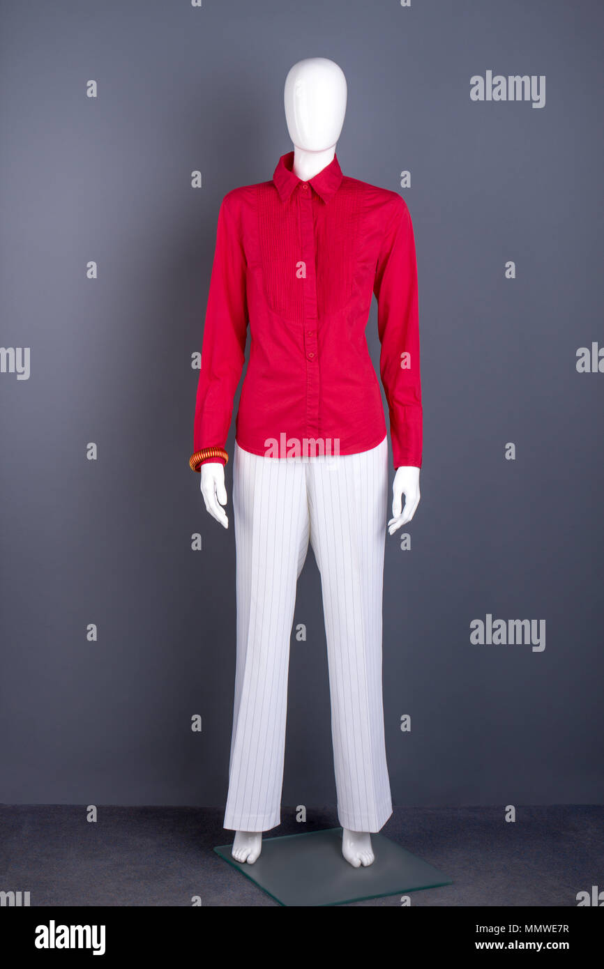 Full length mannequin in red women shirt Stock Photo - Alamy
