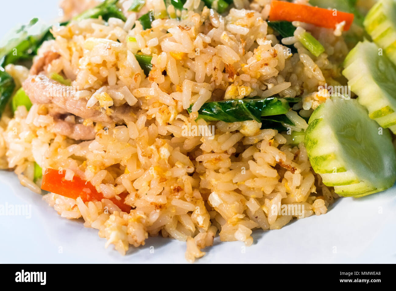 Thai food style , fried rice with pork on white background.Closed up ...