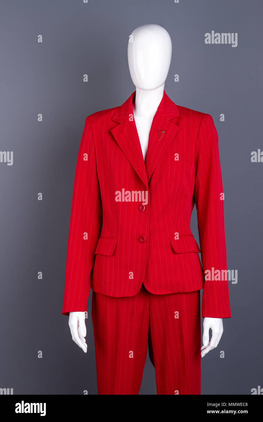 Mannequin in red female formal style suit Stock Photo - Alamy