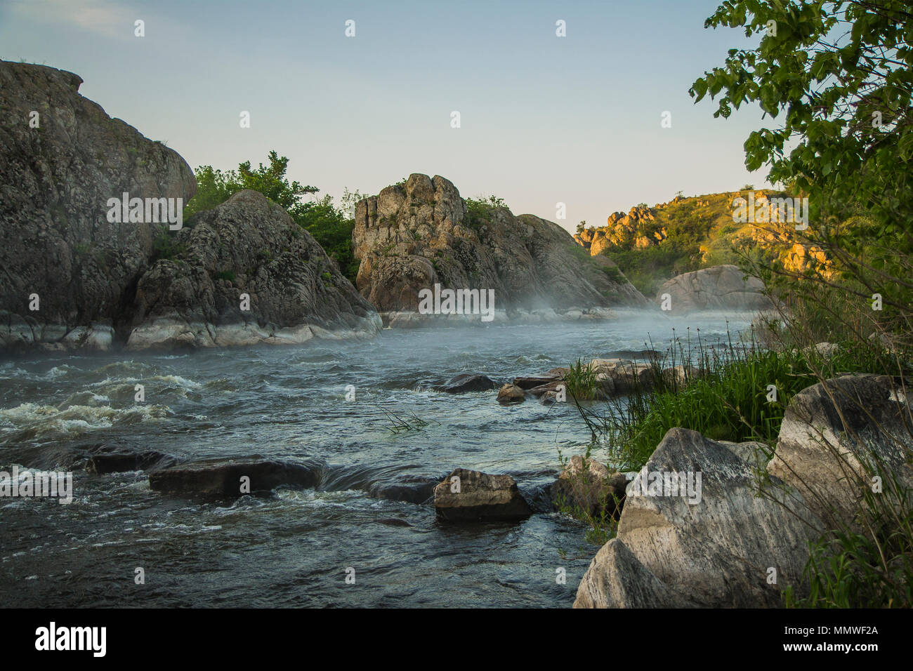 Small mountain river. Landscape with stream flowing between rocks ...