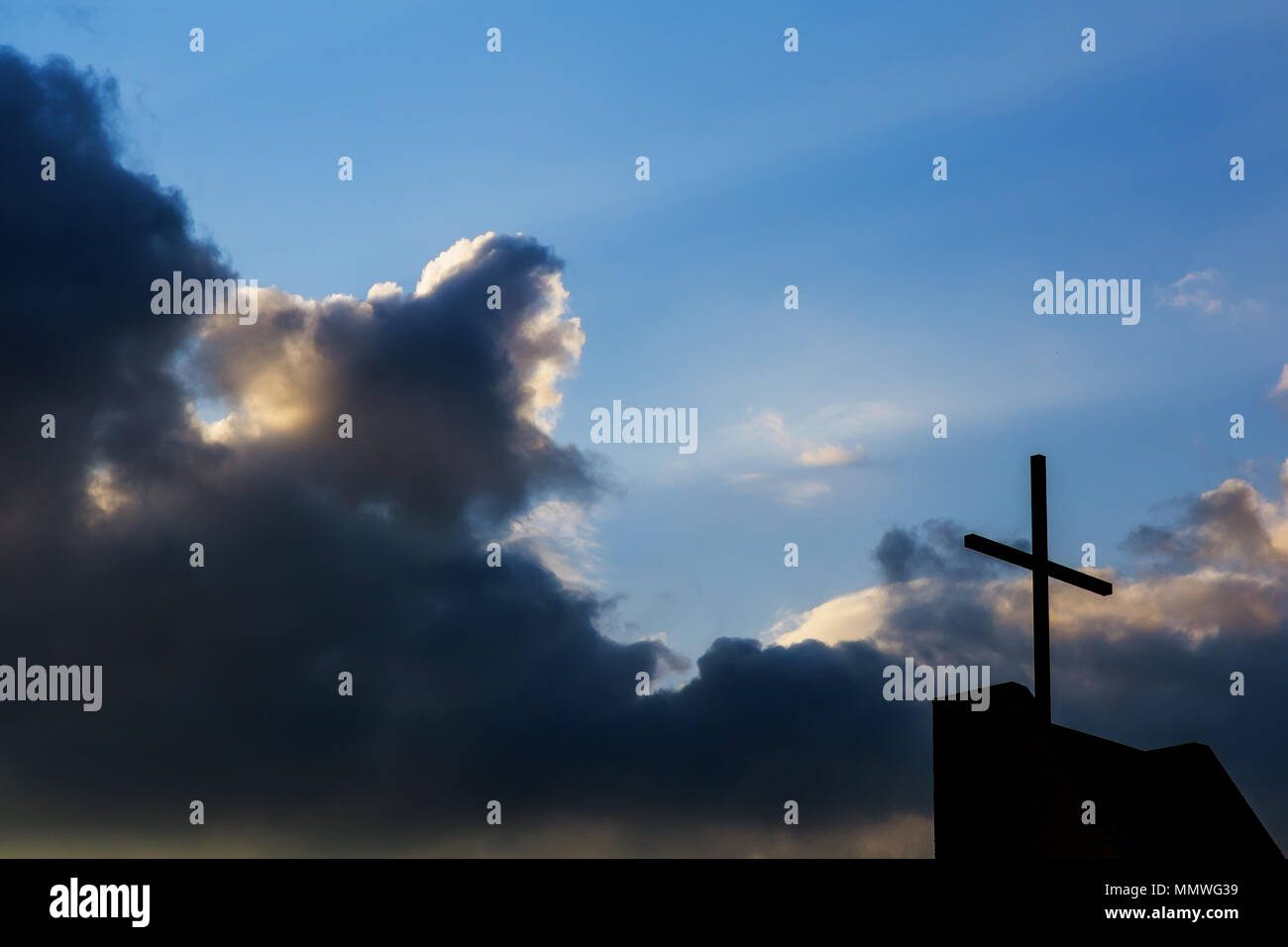 Cross against the sky background. religious christian cross with sunset ...