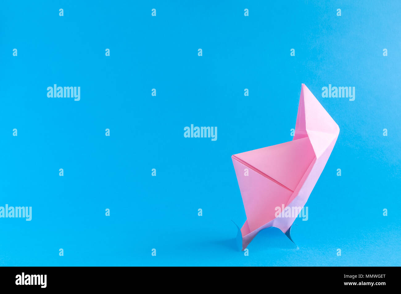 Paper boat sinking minimal creative concept Stock Photo - Alamy