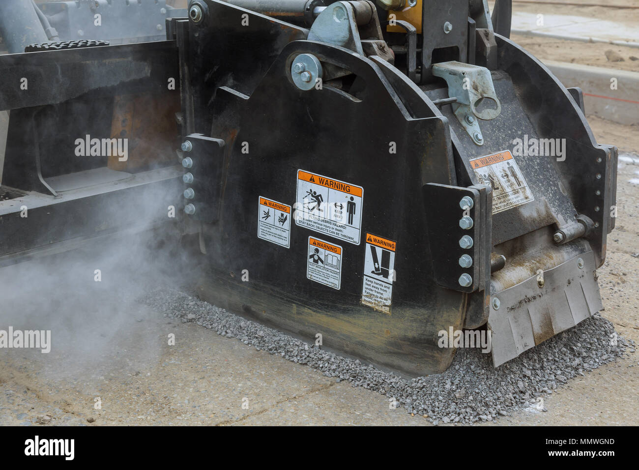 Road work removes the debris from demolition of old derelict with an ...