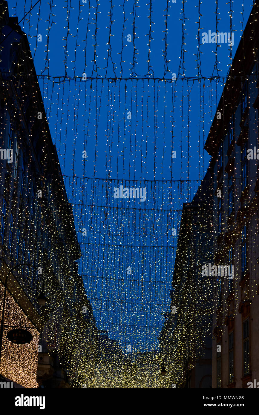 Kohlmarkt street on early winter evening, blue hour, with contrasting ...