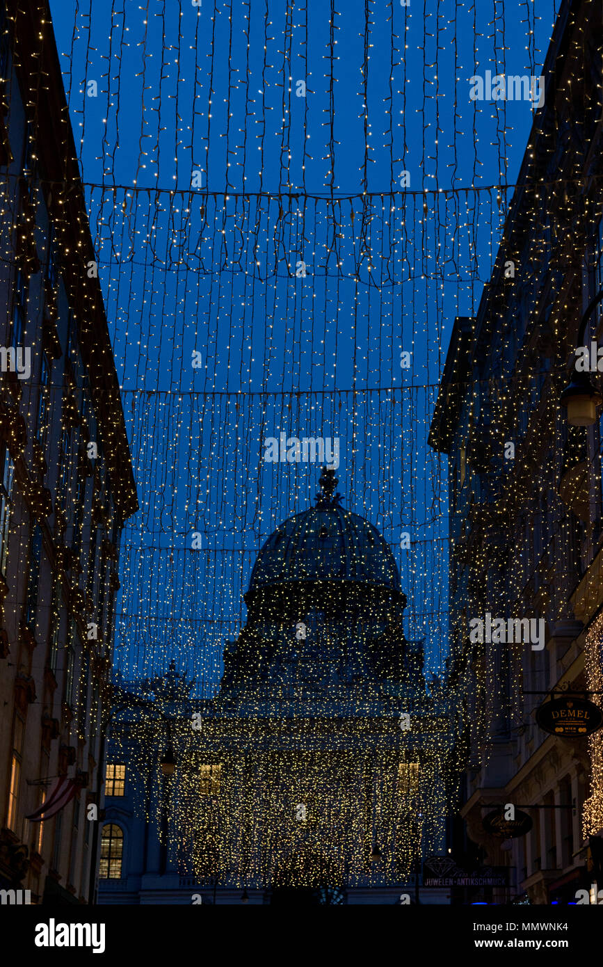 Kohlmarkt street on early winter evening, blue hour, with contrasting ...