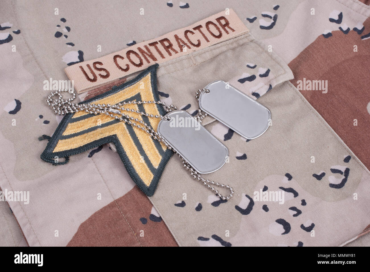 us contractor uniform with dog tags and sergeant rank patch Stock Photo ...