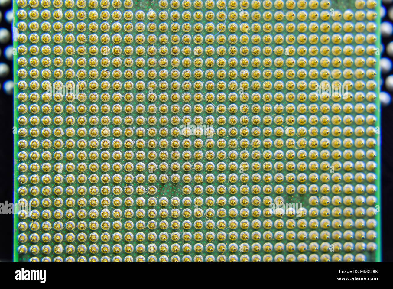 Computer processor, contact feet. Electronic board with electrical ...